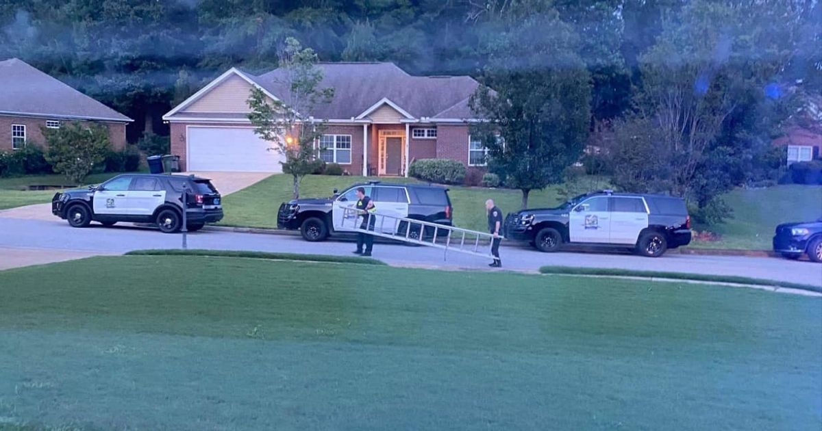 Family Escapes Through 2nd-Story Window During Armed Standoff After ...