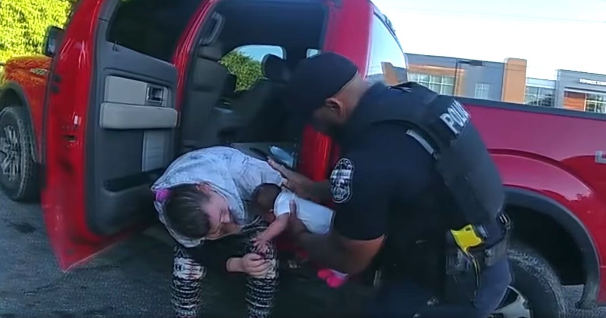 Video: Cop Saves 7-Day-Old Baby After Desperate Father Runs Into Gas ...